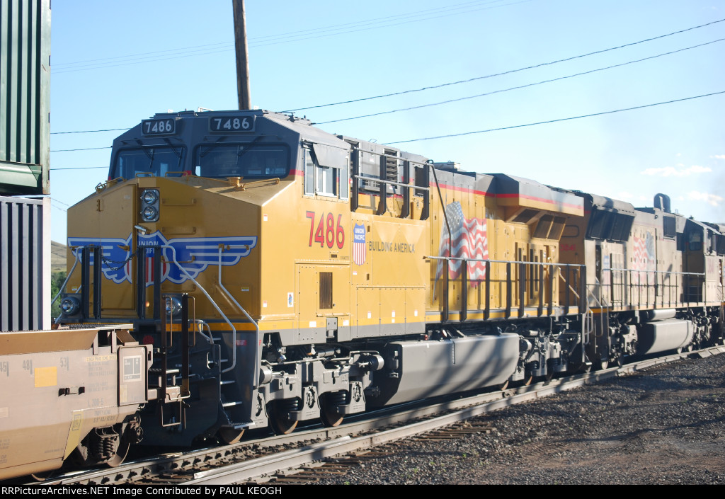 UP 7480 goes by me as she starts to pull the Grade out of UP Rawlins Depot westbound.